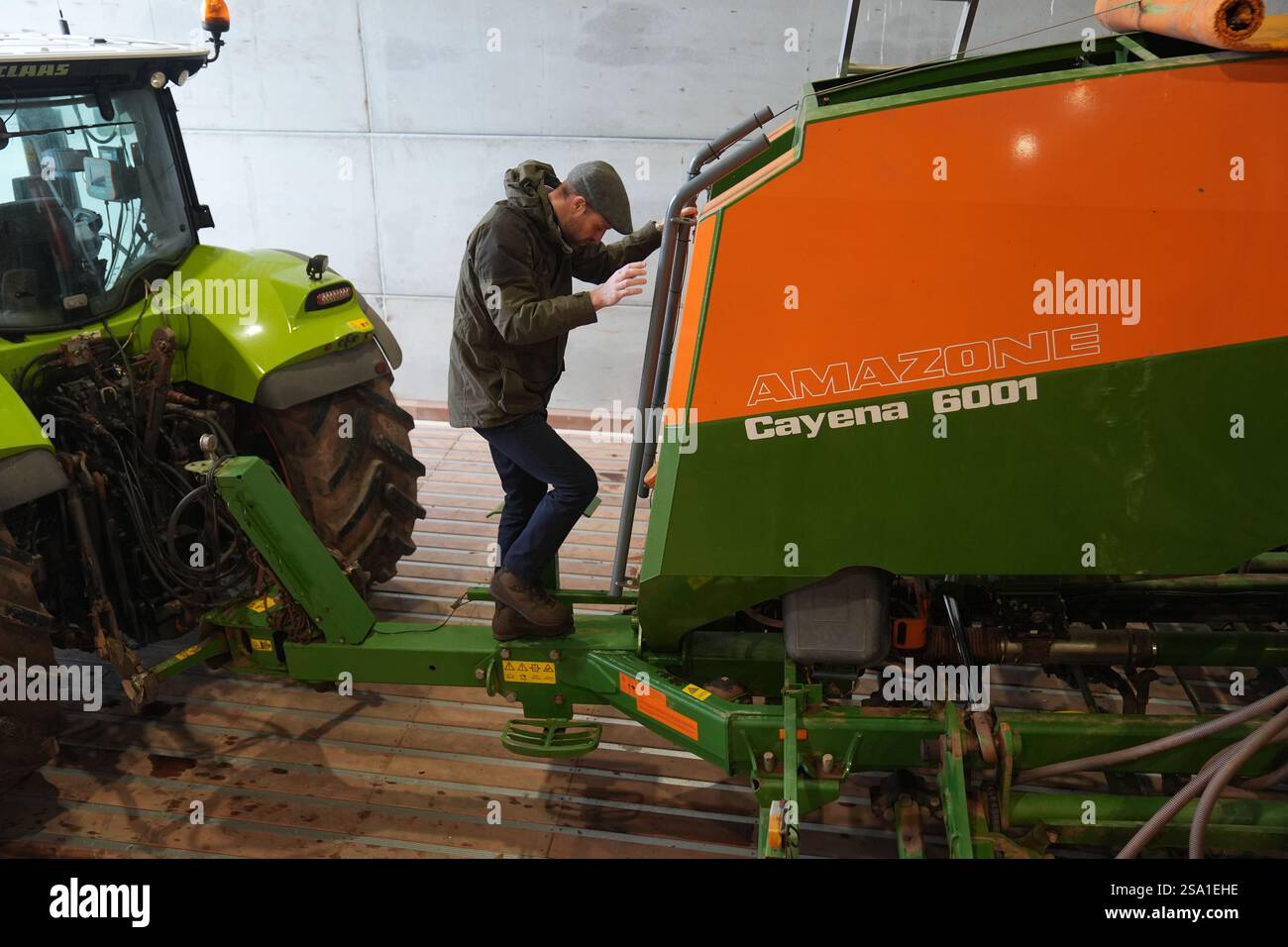 The Prince of Wales being shown a seed drill during a visit to Lower ...