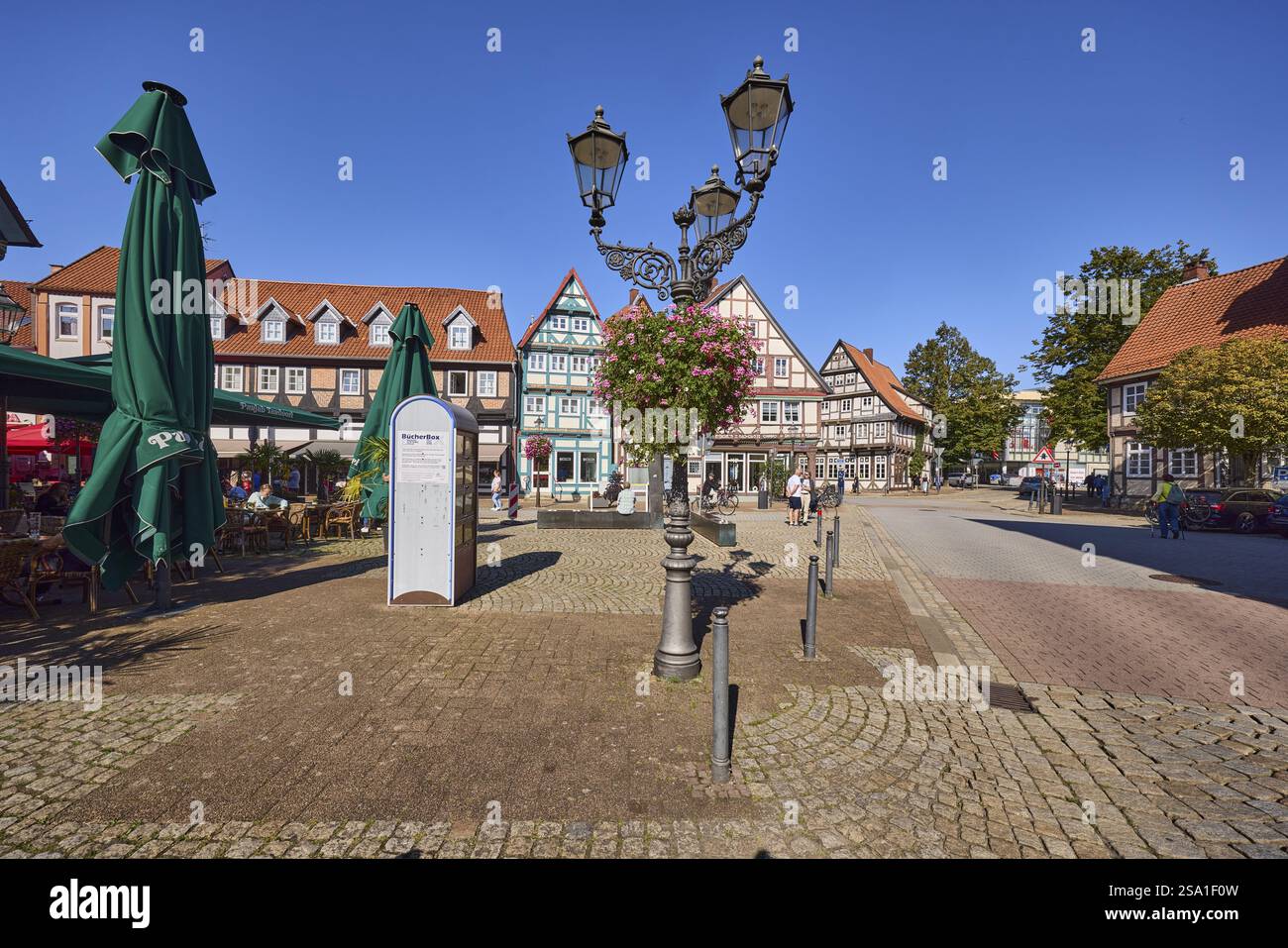 Lantern, flower decoration, outdoor area of a restaurant, book box ...