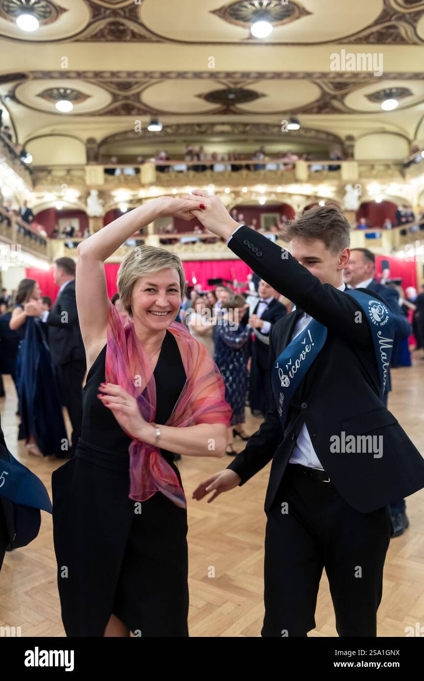 Mother dancing with son on traditional graduate ball in Prague's famous ...