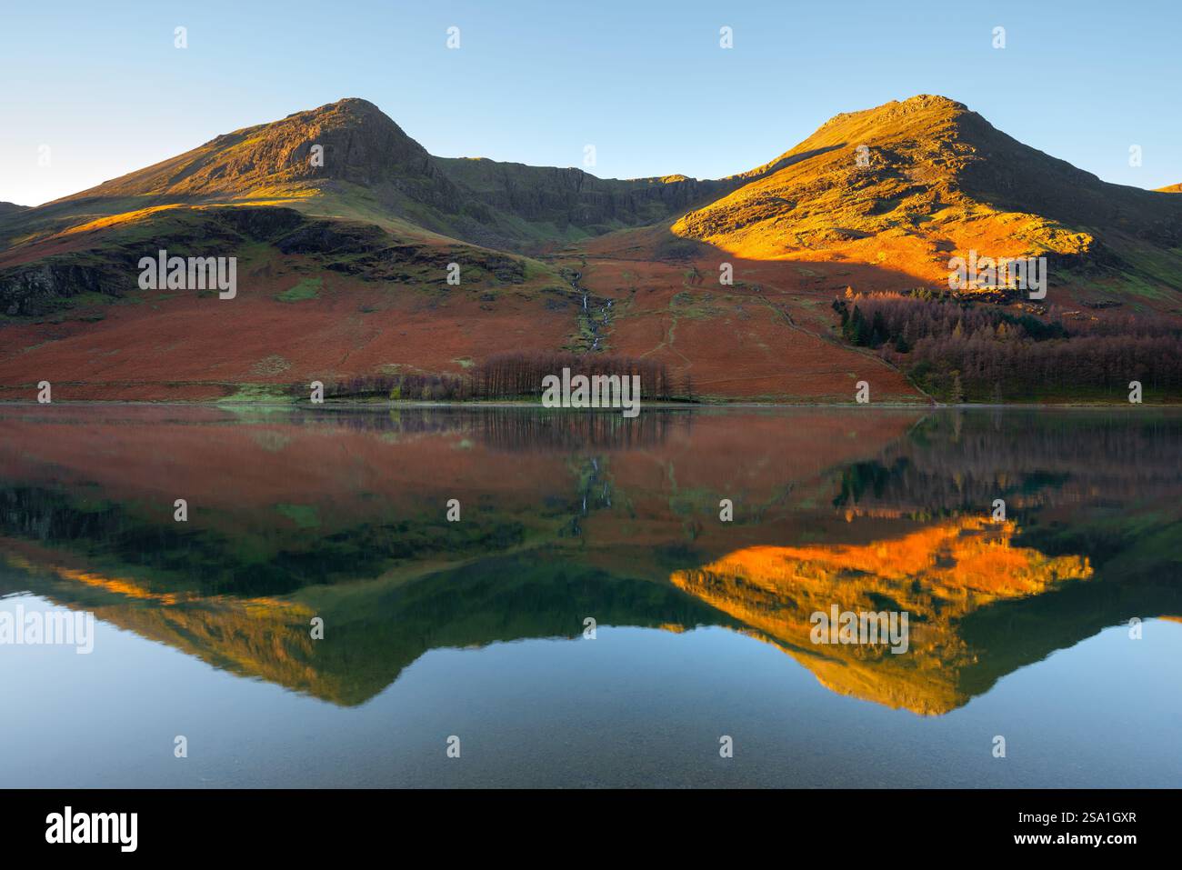 Sunrise reflections at Buttermere in The Lake District, UK Stock Photo ...