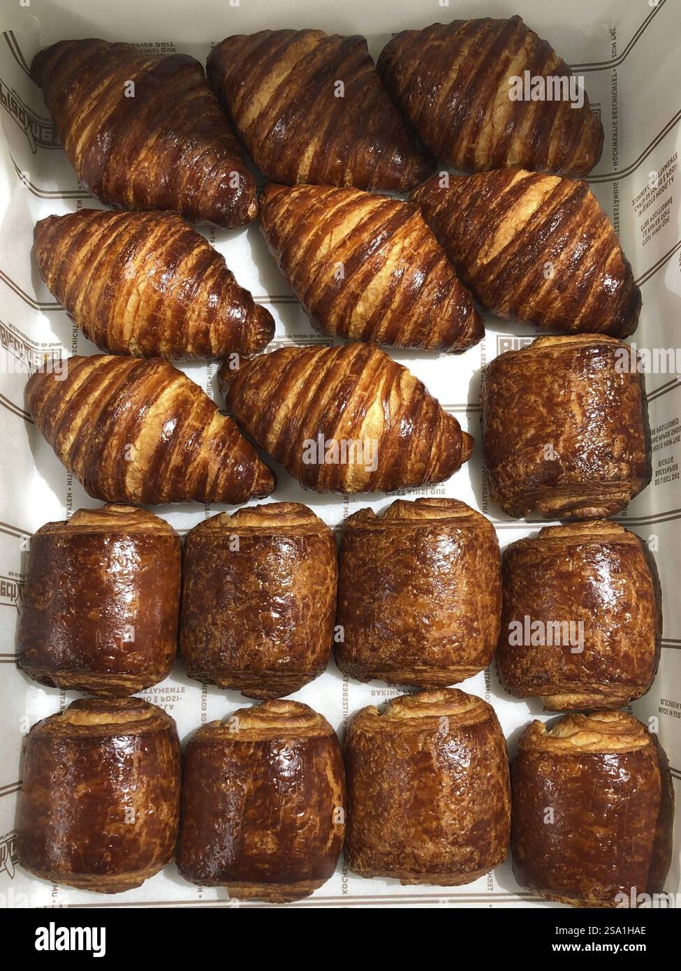 Freshly baked croissants and pains au chocolat, Vienna, Austria, Europe ...