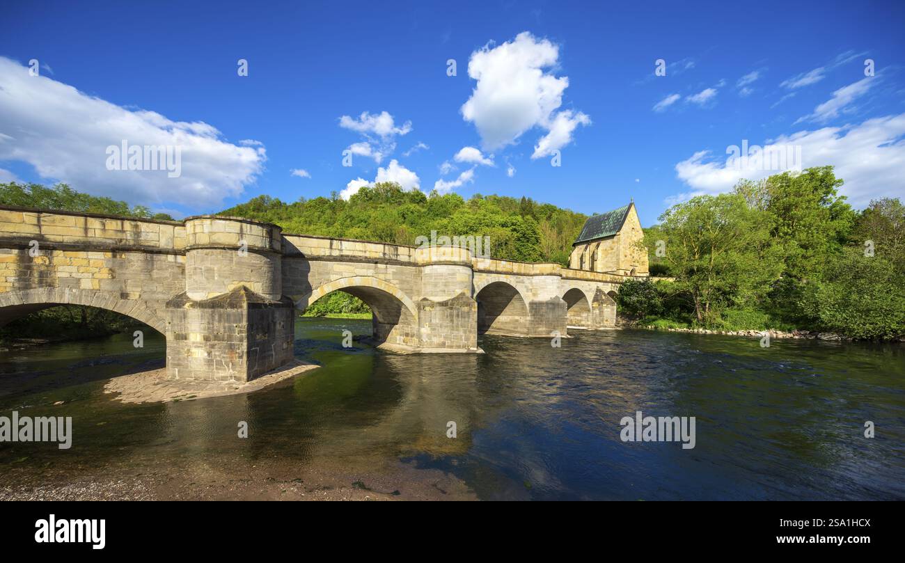 Old stone bridge from 1223 over the river Werra with bridge chapel ...