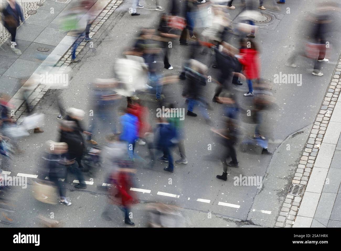 Passers-by crossing a street, long exposure, Germany, Europe Stock ...