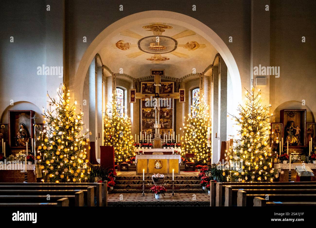 A beautifully decorated church interior during the Christmas season ...