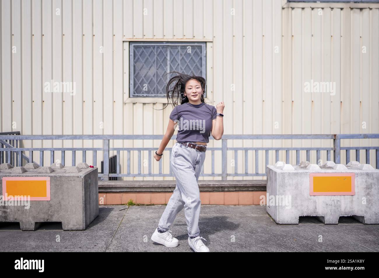 Modern young beauty woman dancing k-pop korean dance in the city Stock ...