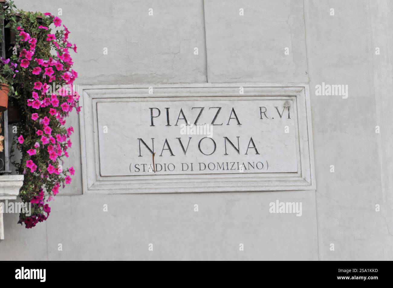 A sign of Piazza Navona with flower pots on the wall, Vatican, Rome ...