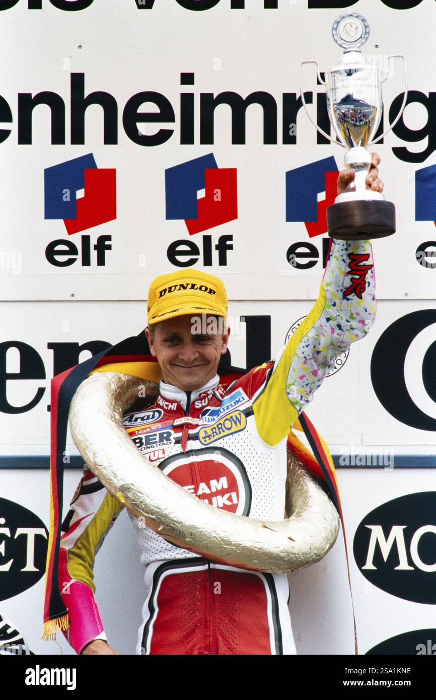 Racer Kevin Schwantz USA, award ceremony, trophy, winner's wreath ...
