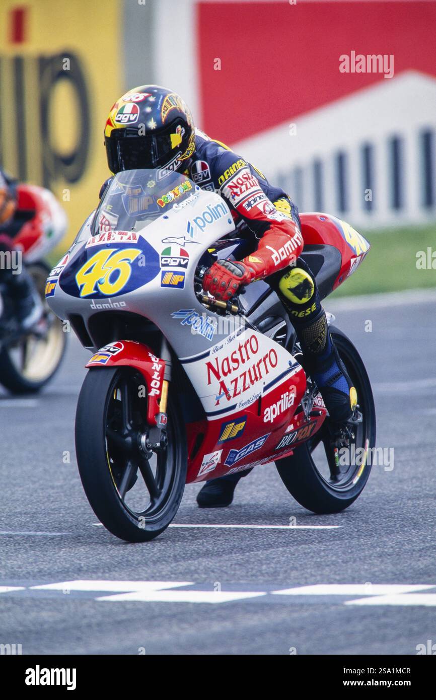 World Champion Valentino Rossi (ITA) at the start, #46 Aprilia 125 cc ...