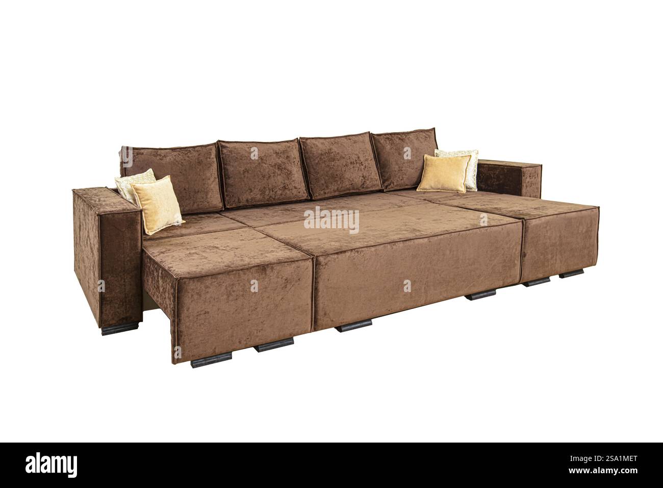 Brown unfolded sofa with velor fabric pillows isolated on a white ...