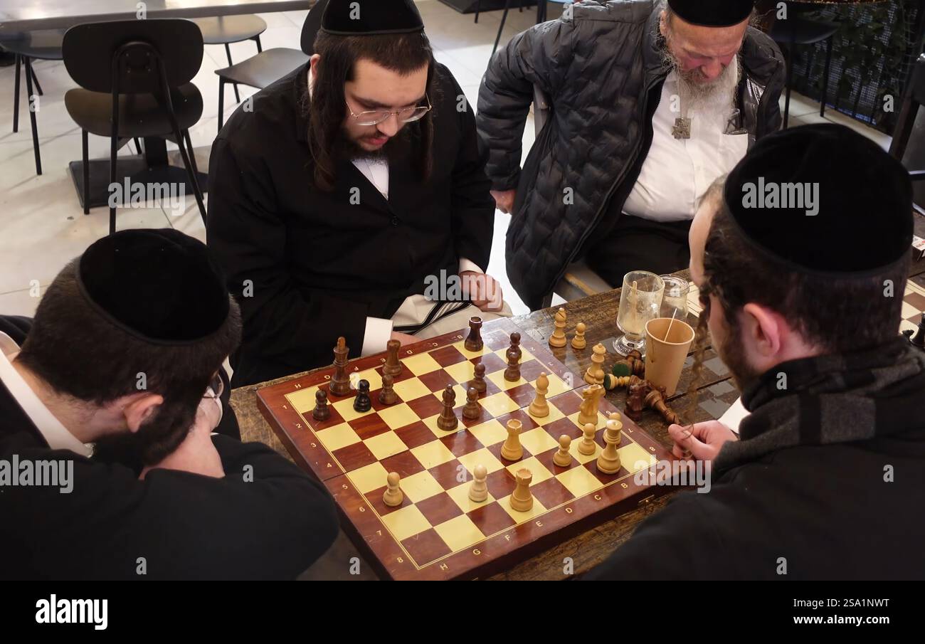Haredi Jews play chess in a coffeehouse in Mahane Yehuda market, in ...