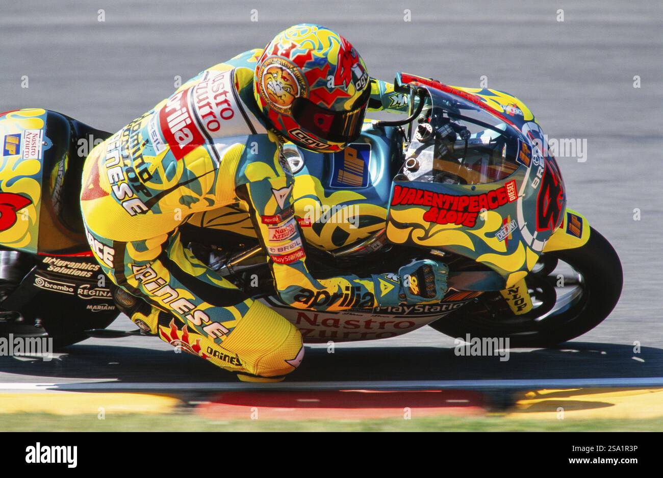 World Champion Valentino Rossi (ITA), close-up in leaning position, #46 ...