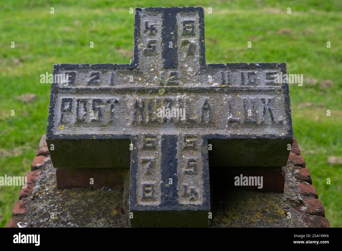Historic sundial in form of Greek cross, garden of monumental building ...