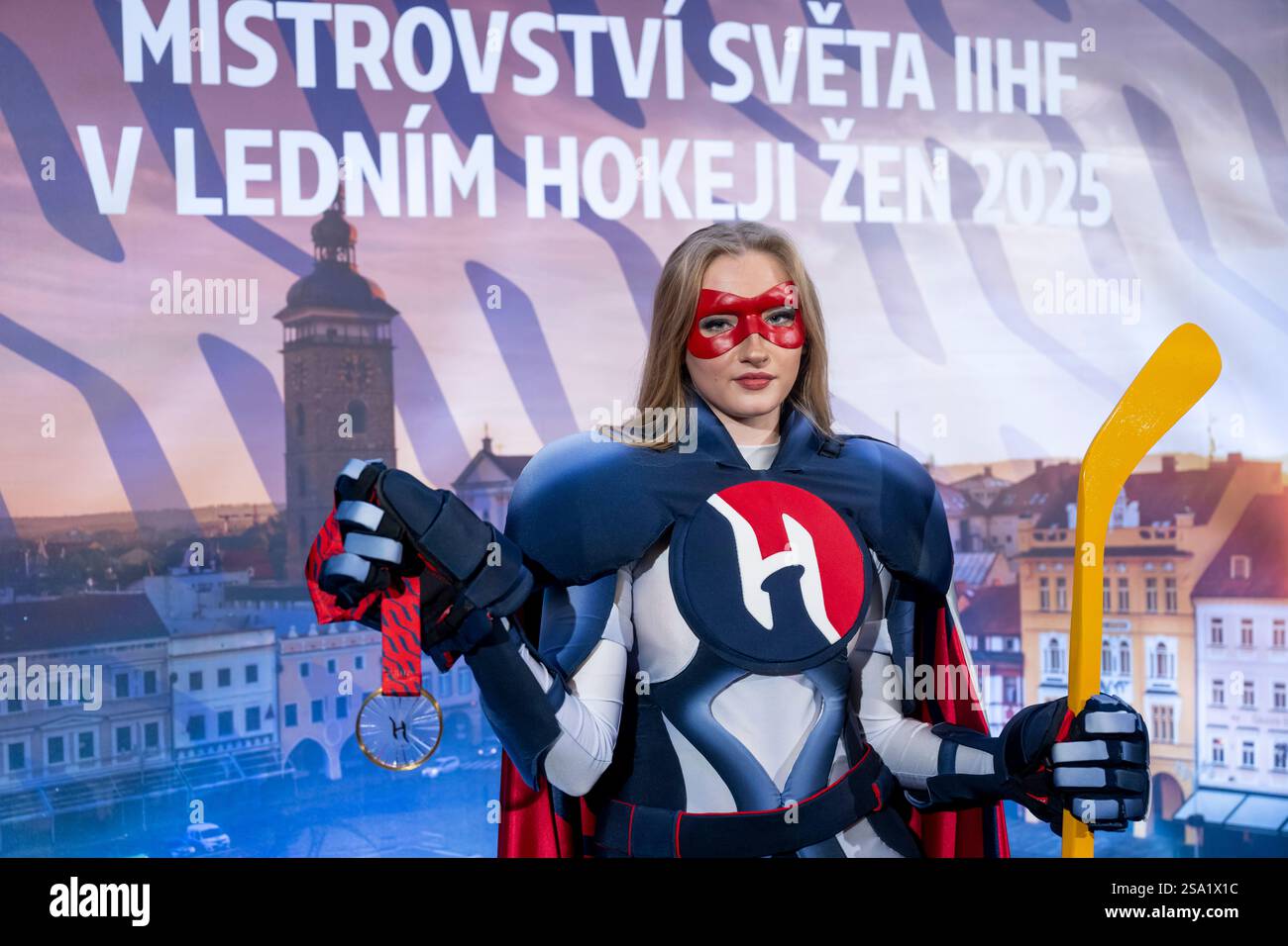 The mascot poses with a medal at the press conference for this year's Women's Ice Hockey World ...