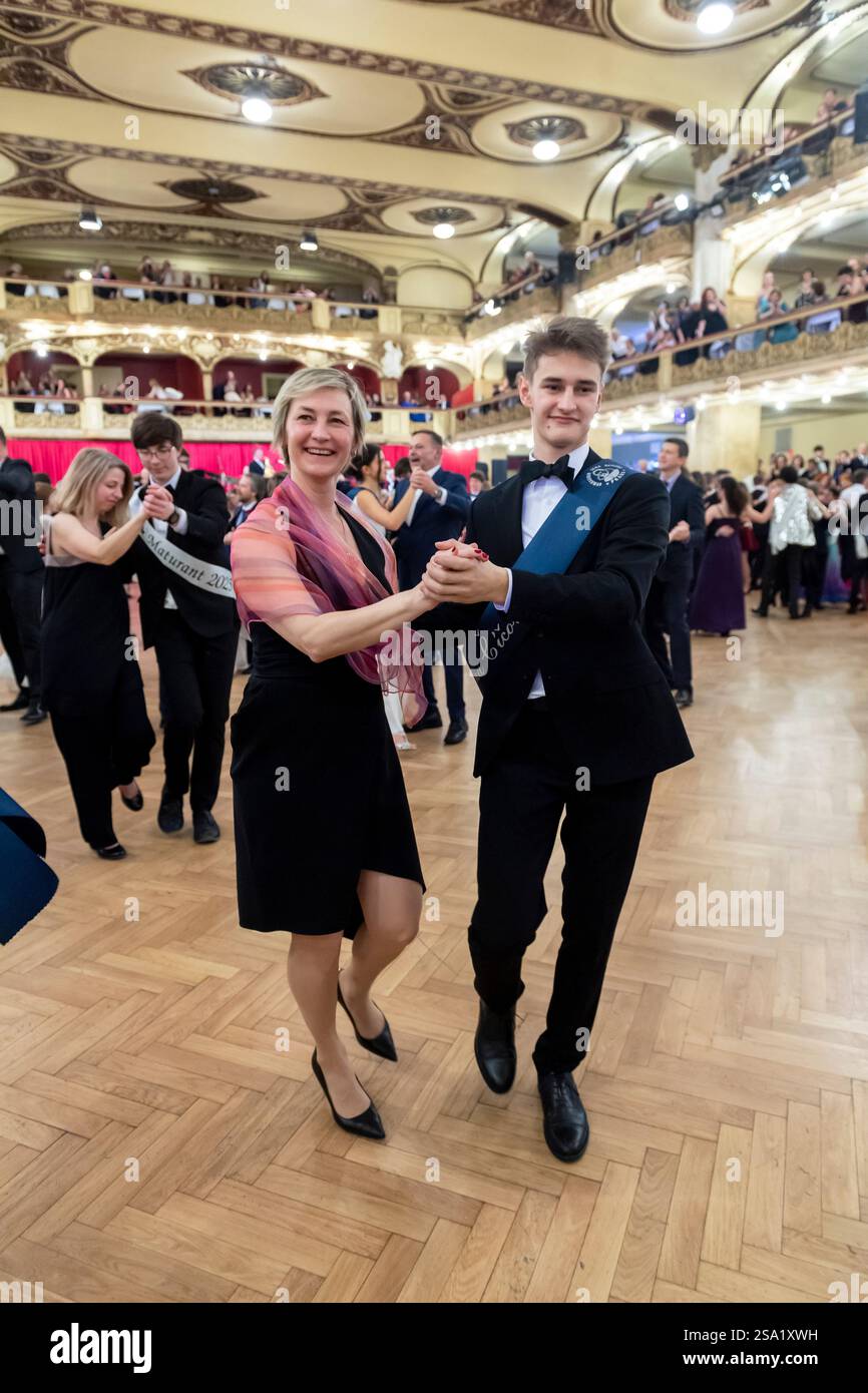 Mother dancing with son on traditional graduate ball in Prague's famous ...