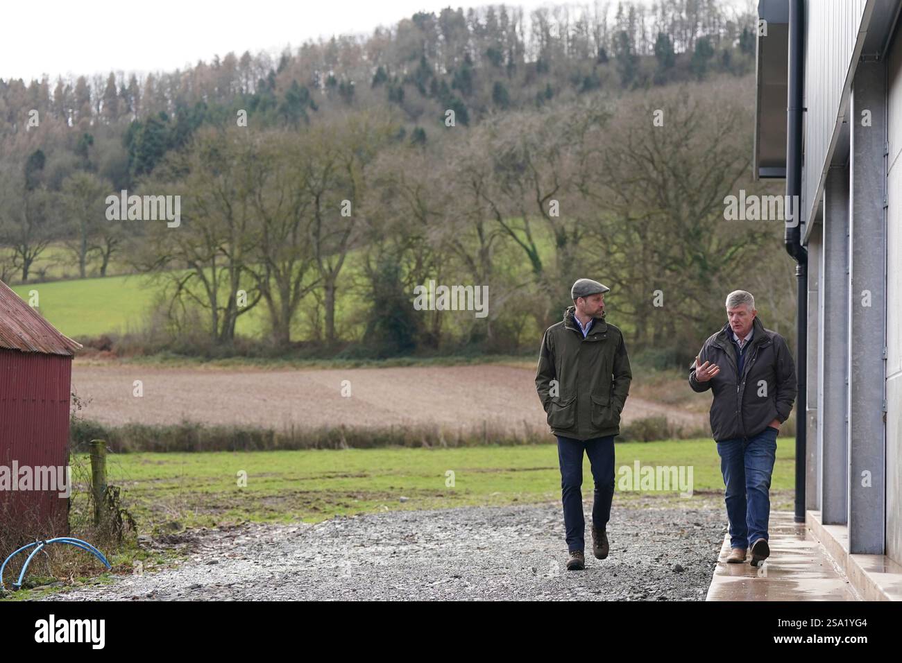 Britain's Prince William, left, visits Lower Blakemere Farm, a Duchy ...