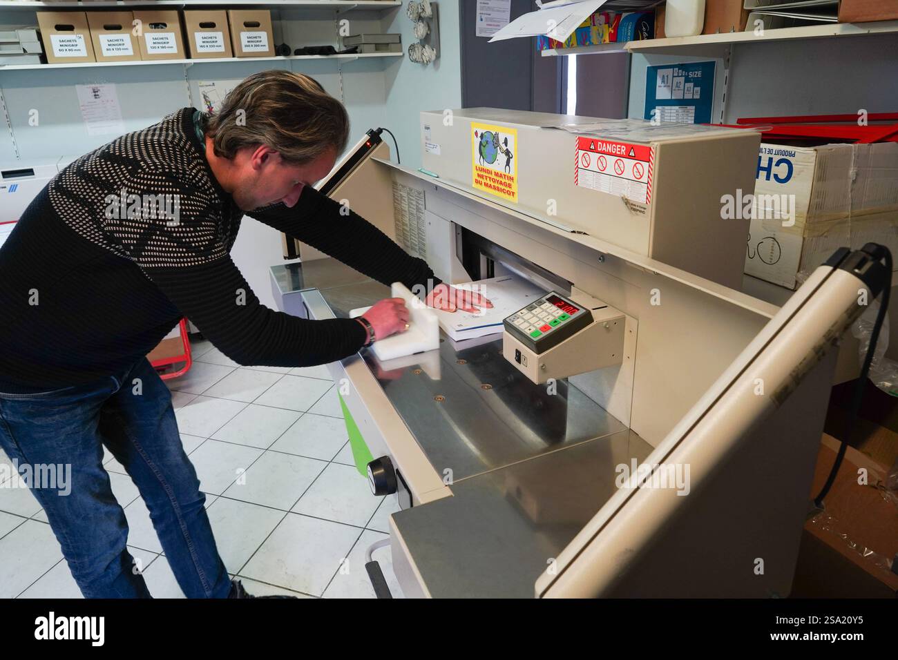 Disabled worker working in the printing, reprography and marking ...