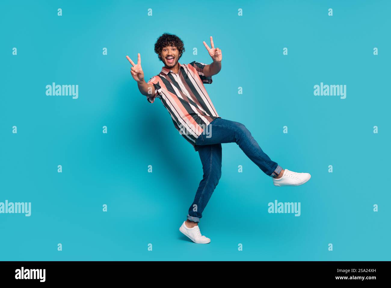Full body portrait of nice young man dance show v-sign wear shirt ...