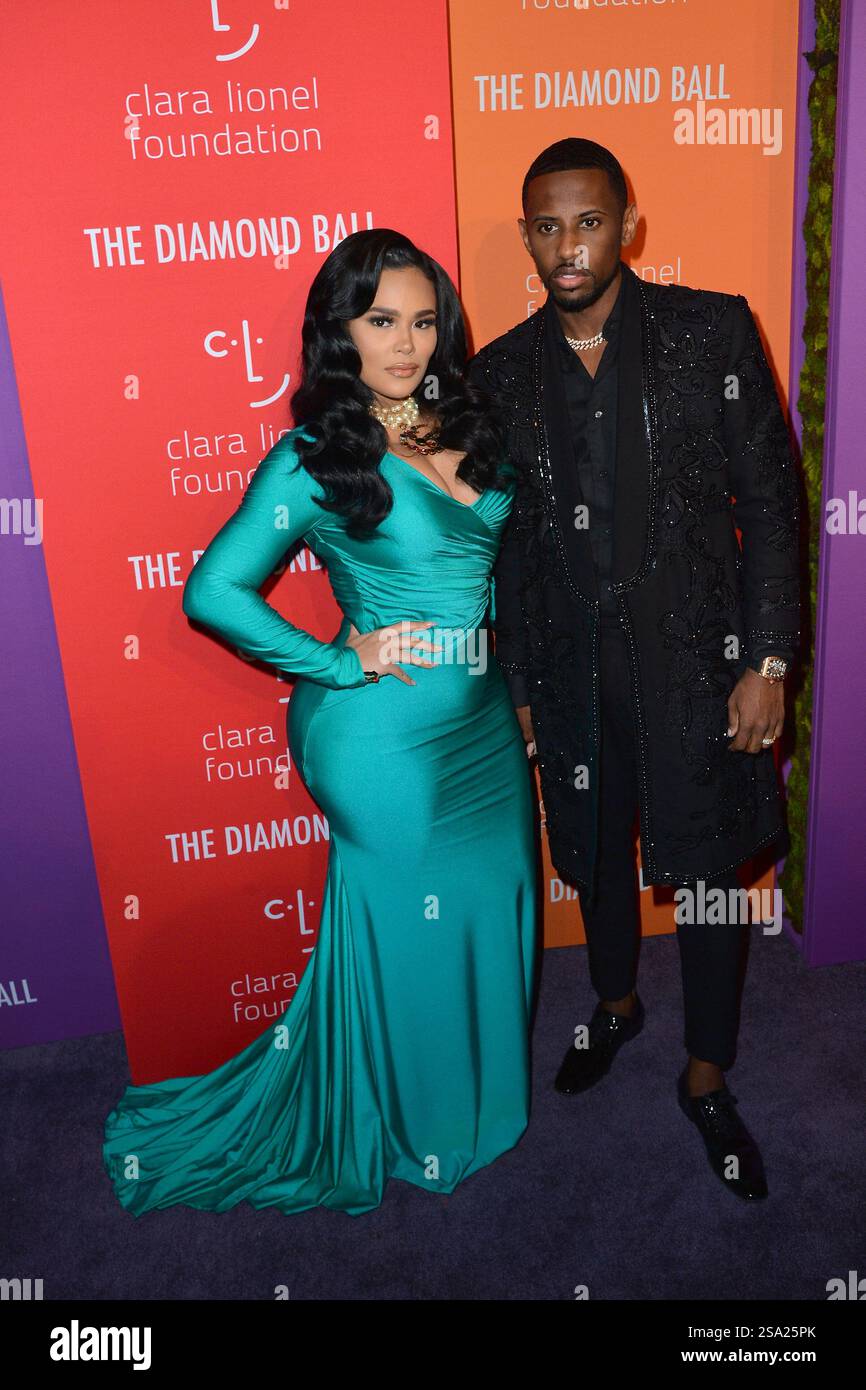 Emily Bustamante and Fabolous attending the 5th annual Diamond Ball ...
