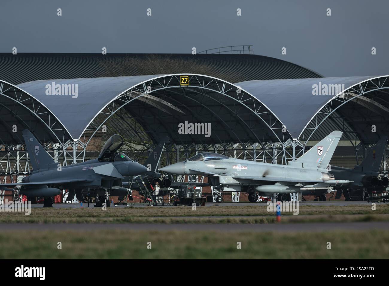 An RAF Typhoons FGR4 sits near the hanger at RAF Coningsby , Coningsby ...