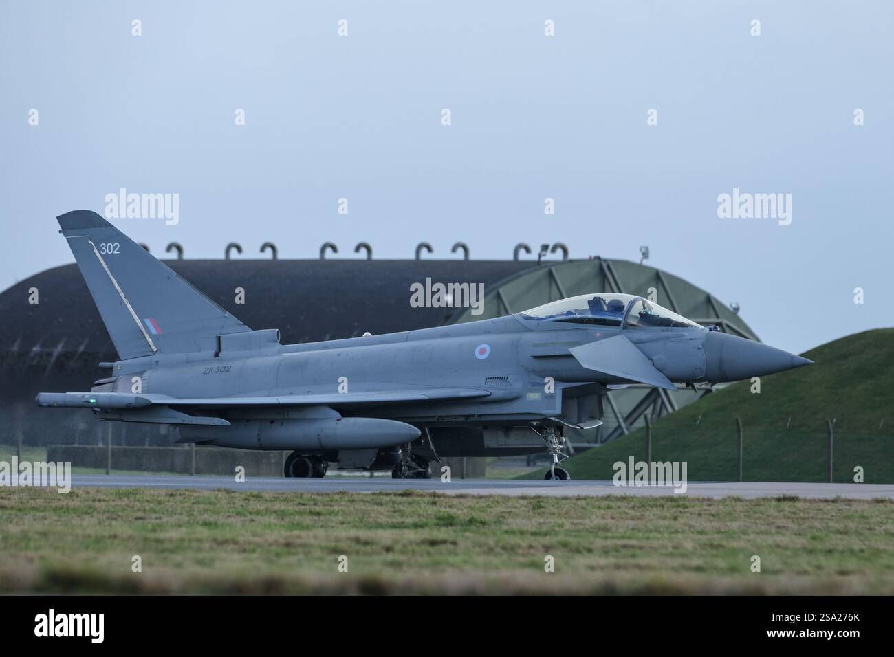 RAF Typhoons FGR4 taxies to the runway at RAF Coningsby, Coningsby ...