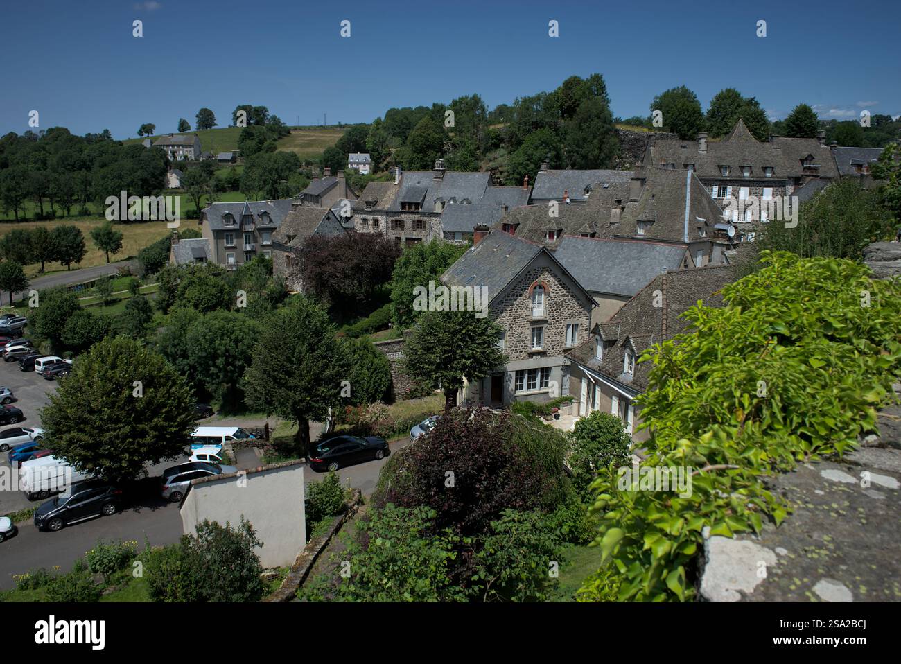 Lauze (slate) roofs in the village of Salers in the Cantal, typical of ...