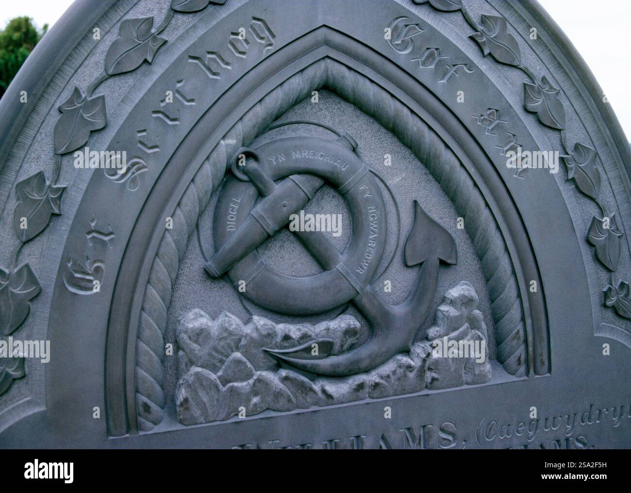 Headstone decorated with symbols of Anchor, Life Belt and Welsh ...