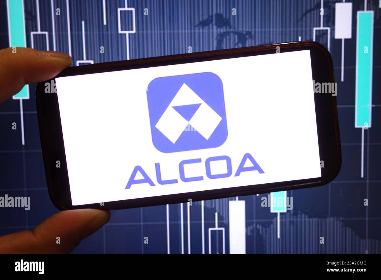 In this photo illustration, the Alcoa company logo is seen displayed on ...