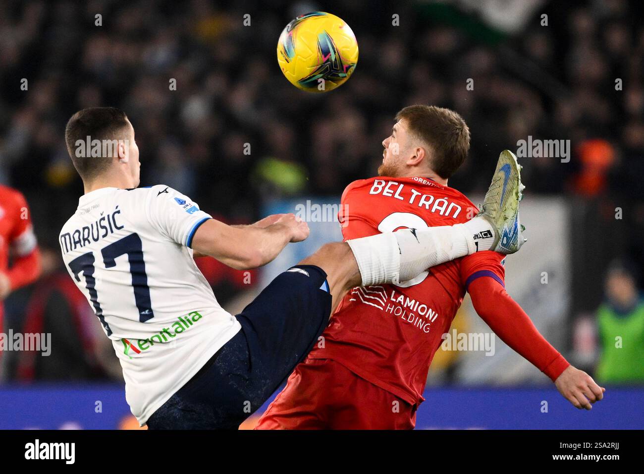 Adam Marusic of SS Lazio and Lucas Beltran of ACF Fiorentina compete ...