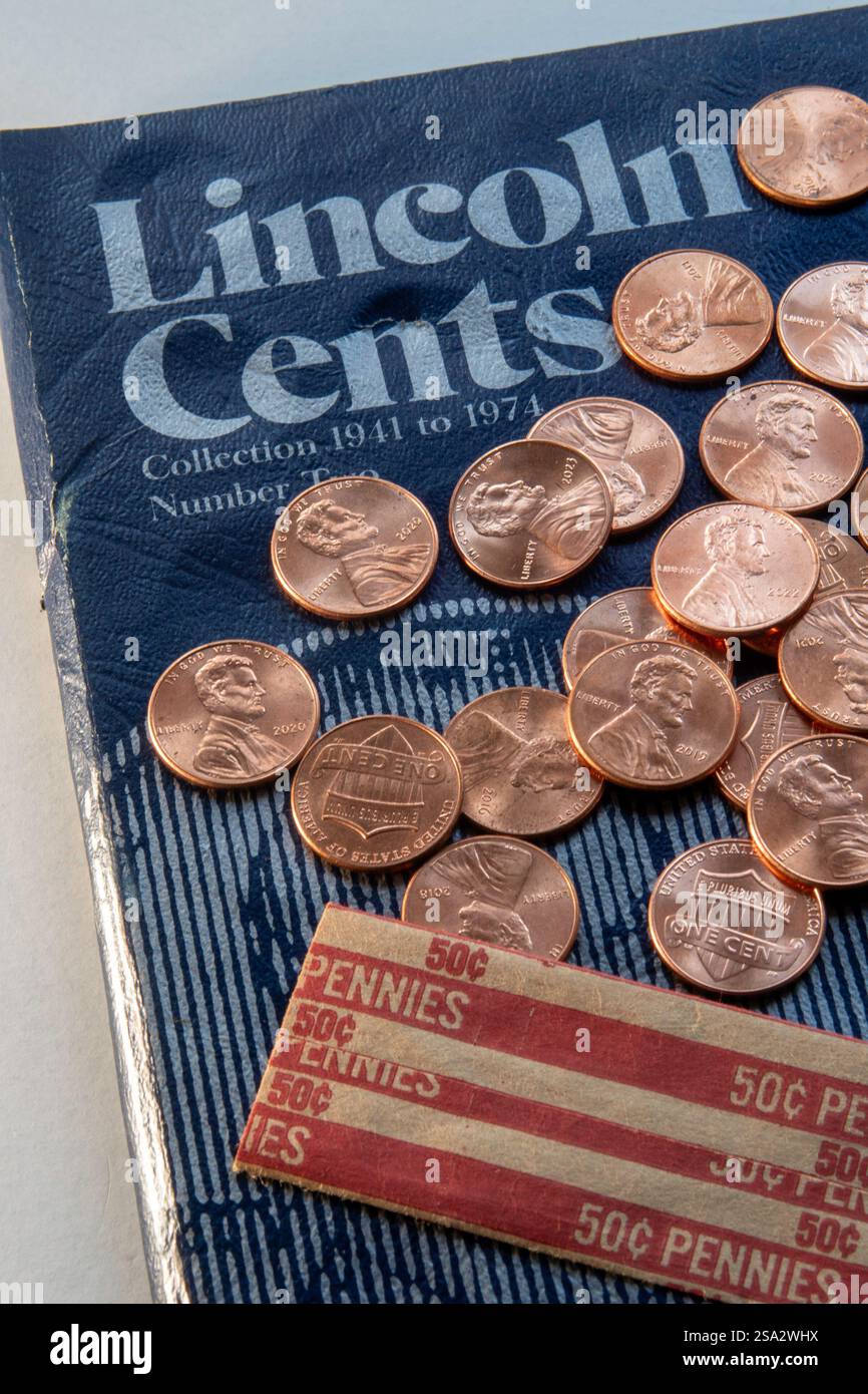 Still life of pennies on a vintage coin collection folder, United ...