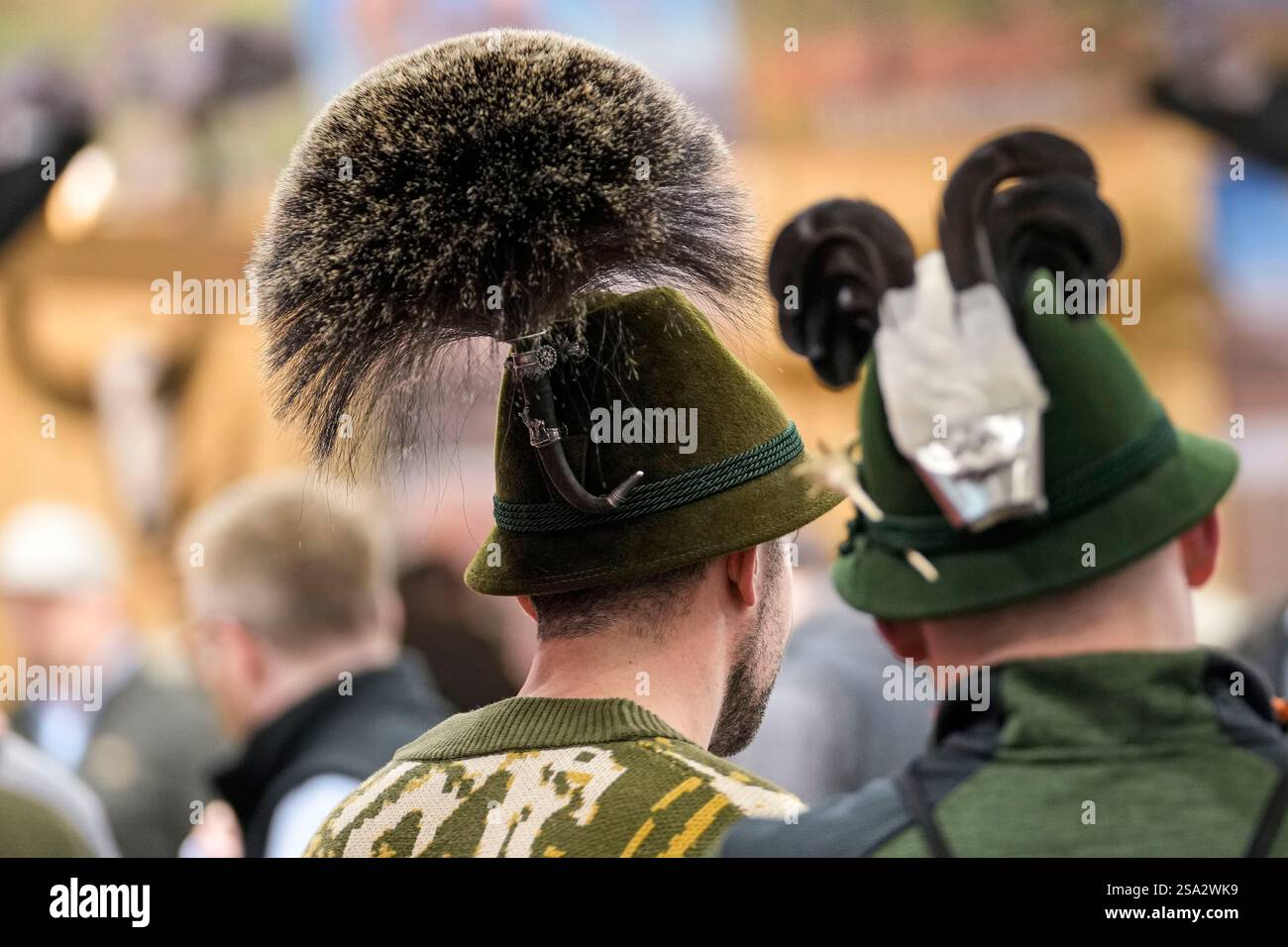 A hunter wears a Gamsbart, a traditional Bavarian decoration hat, at ...