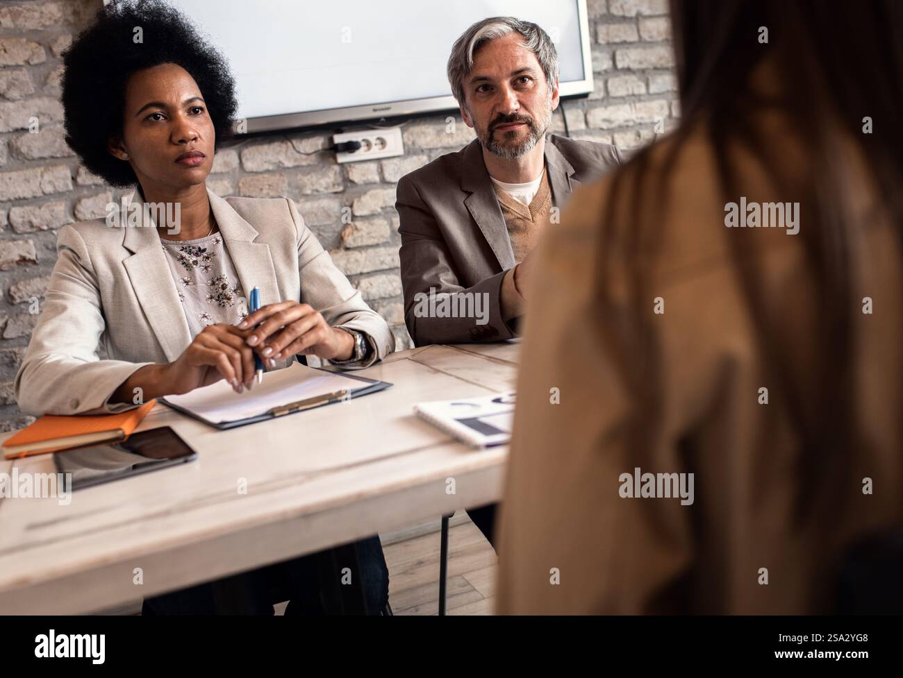 Business recruiters talking with candidate during job interview Stock ...