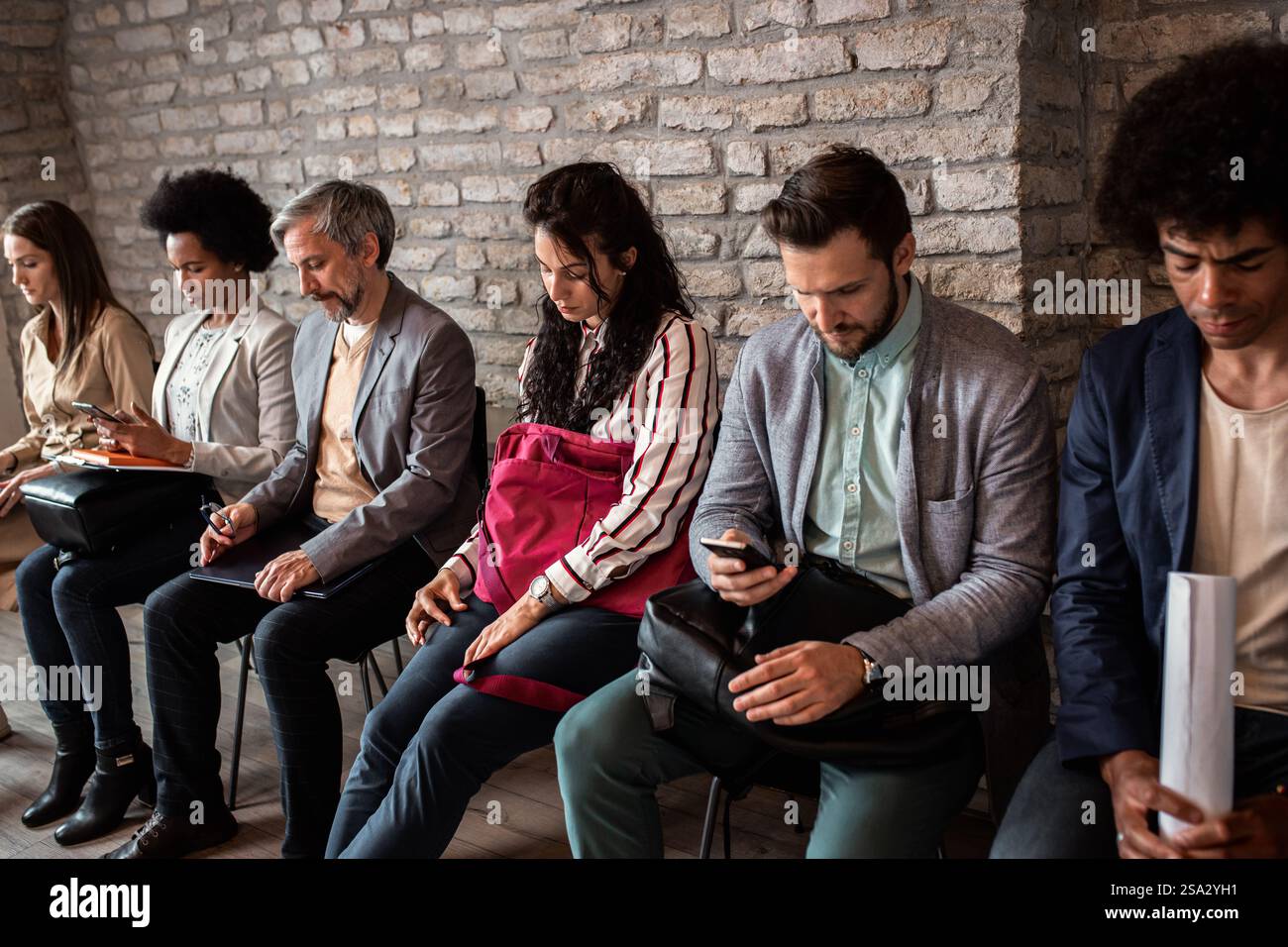 Business people waiting for job interview Stock Photo - Alamy