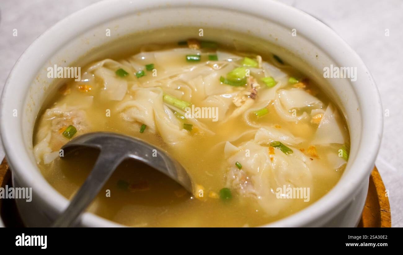 Pancit Molo, a classic Ilonggo soup with dumplings, shredded chicken ...