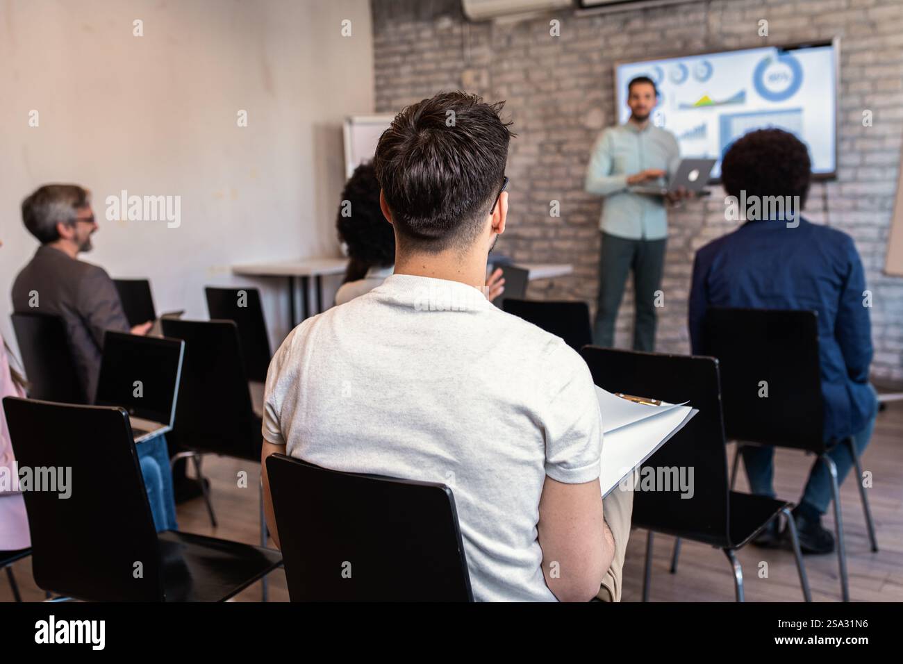 Rear view male female business hi-res stock photography and images - Alamy