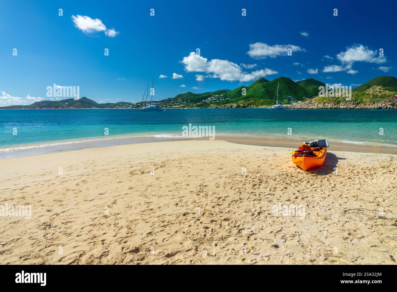 Kayak on the beach of Pinel island, on the French side of the Caribbean ...