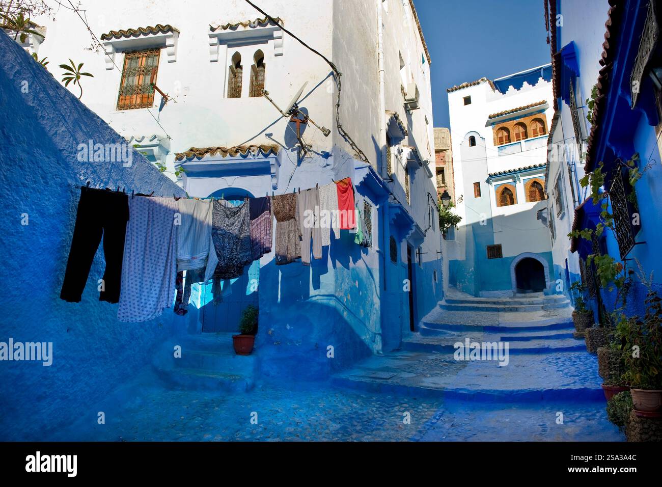 Morocco. Chefchaouen. Clothes Hanging Stock Photo - Alamy