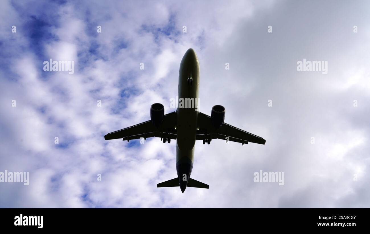 Commercial aircraft approaching landing front hi-res stock photography ...