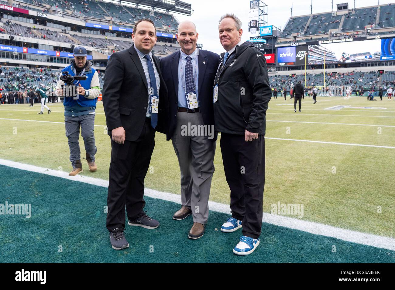 NFL replay official Tyler Cerimeli, replay assistant Jim Van Geffen and ...