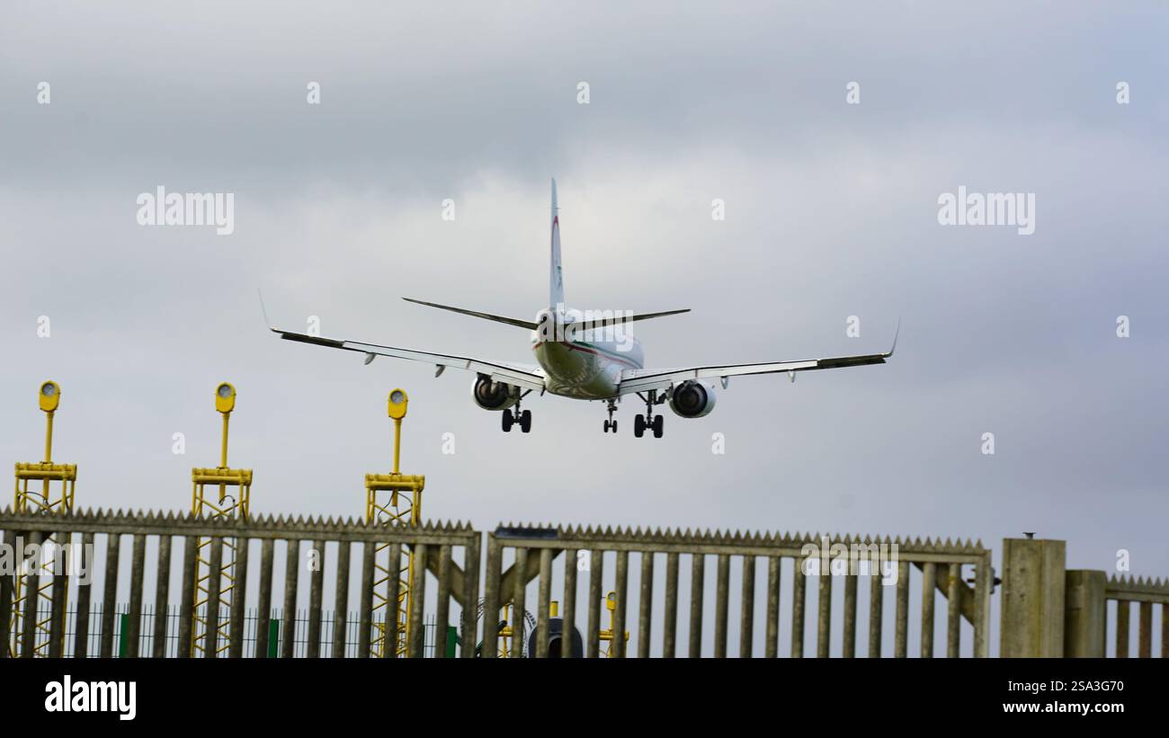 Under the Wings: A Glimpse of the Landing Approach Stock Photo - Alamy