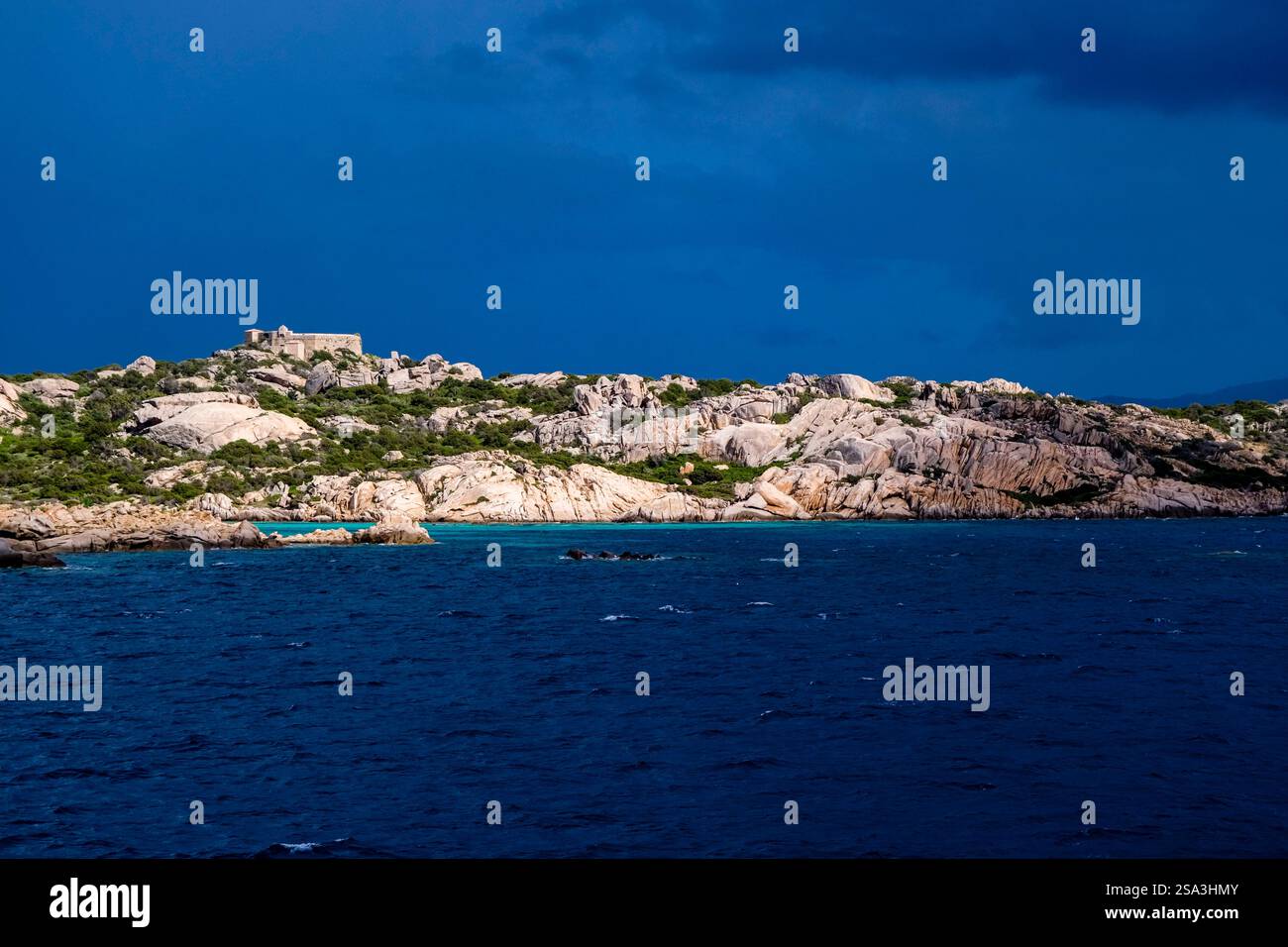 The castle Castello napoleonico and the rocky coast of the island of ...