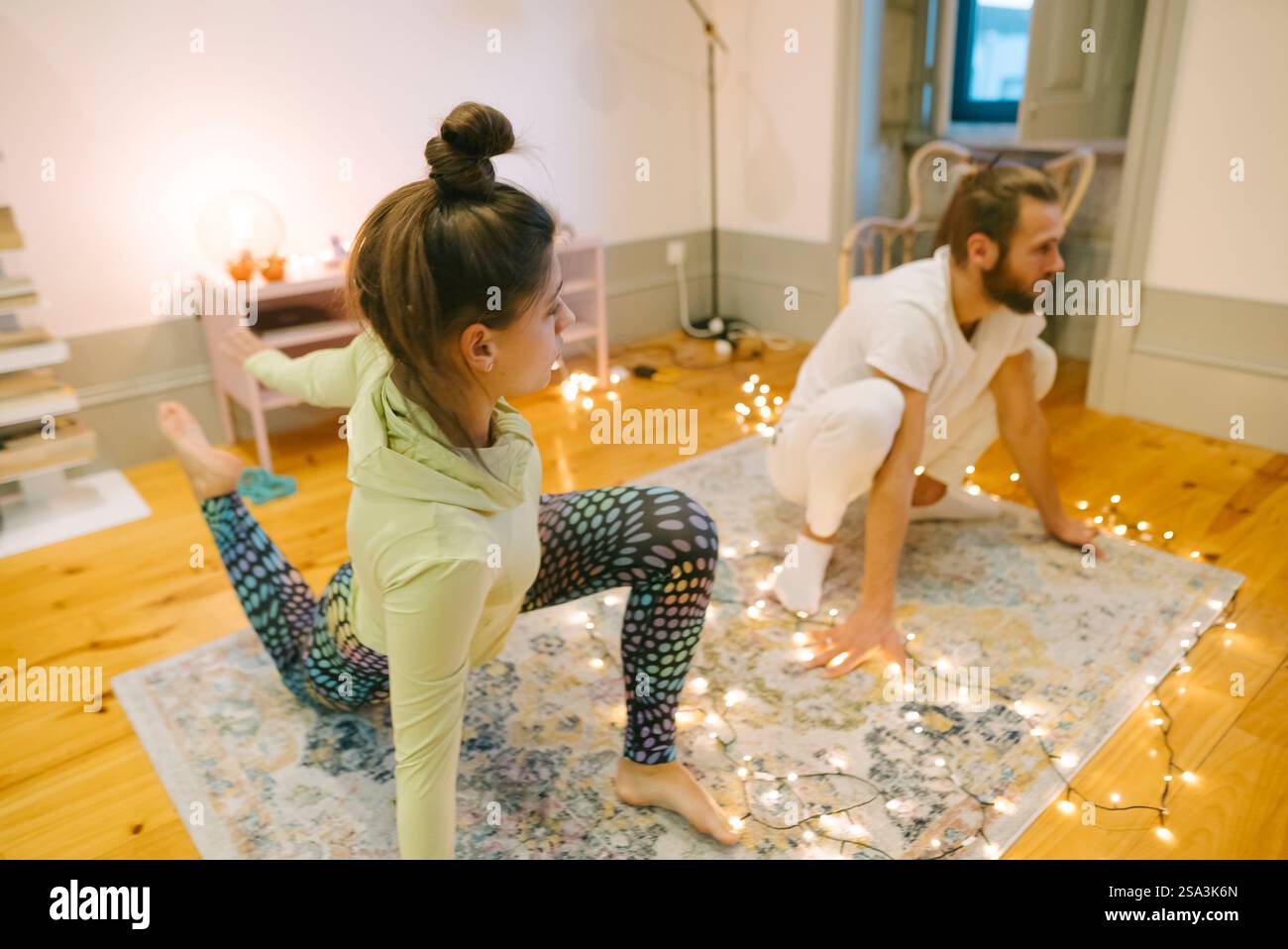 Yoga Partners Engaging in a Relaxed and Cozy Practice Together in a ...