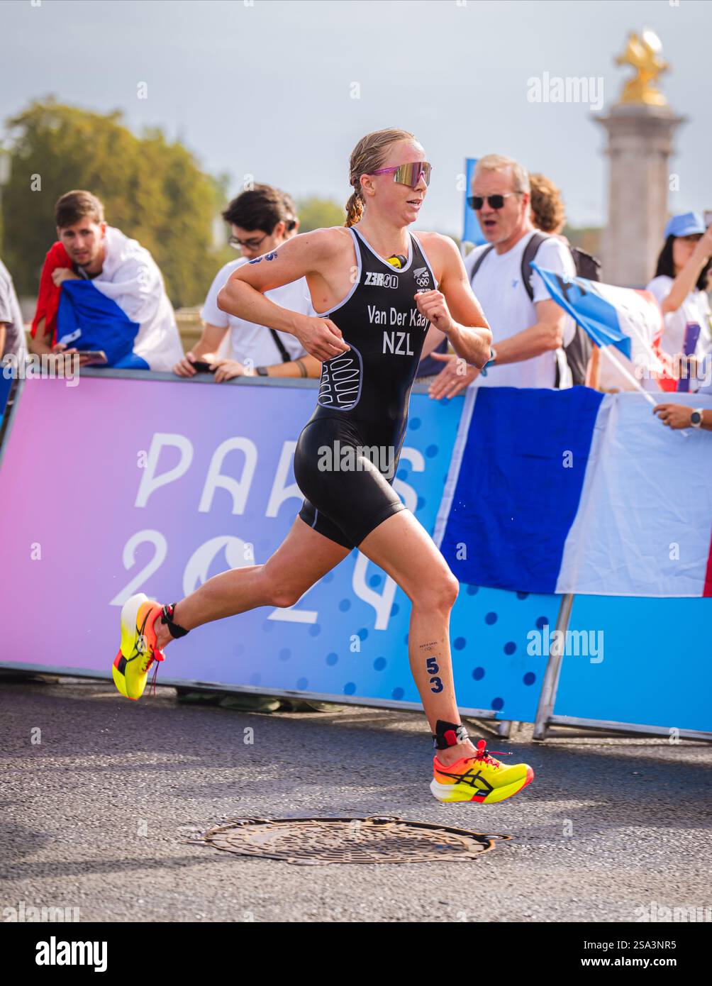 Nicole van der Kaay participating in the triathlon at the Paris 2024 ...