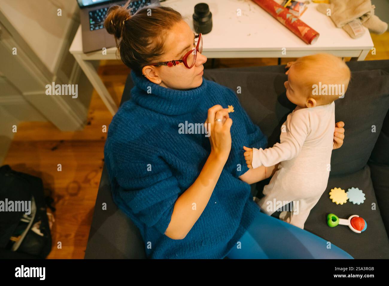 Cozy Moments Parent and Baby Engaging in Warm Interactions at the ...