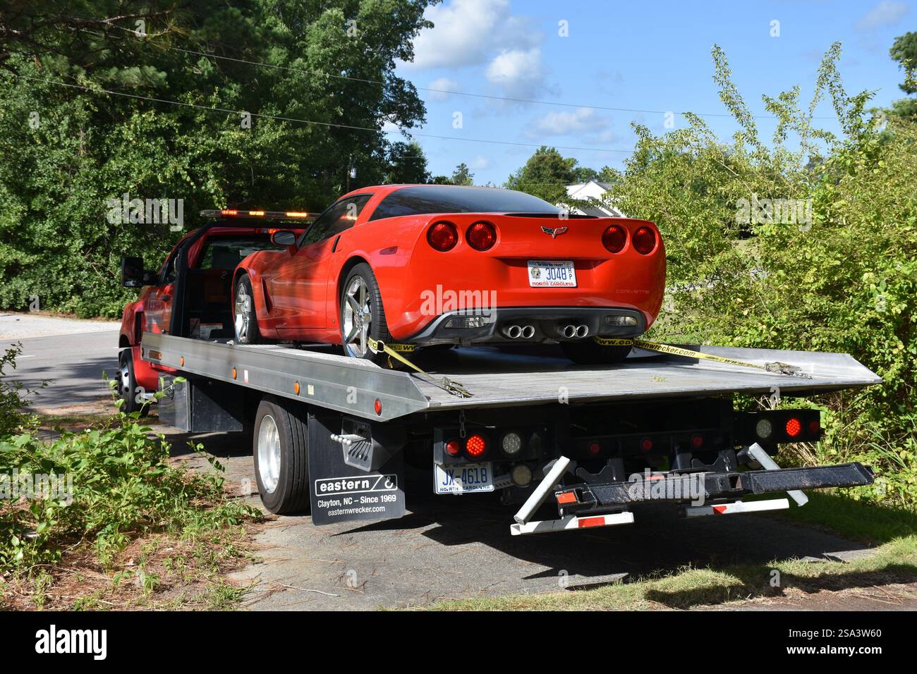 A 2007 Corvette loaded on a Rollback wrecker Stock Photo - Alamy