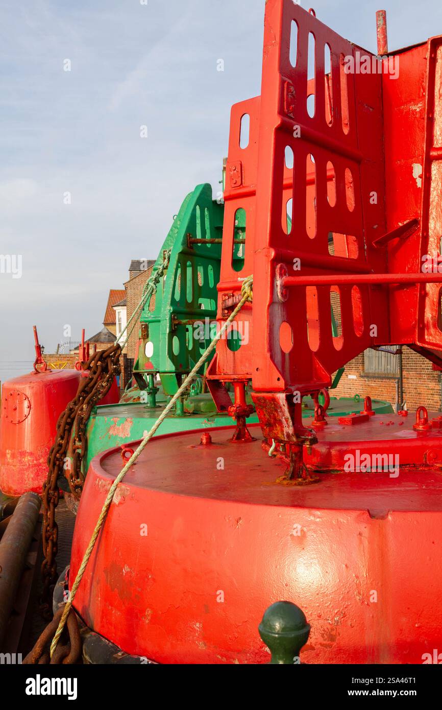 Red and green navigation buoys in the buoy maintenance area on Purfleet ...