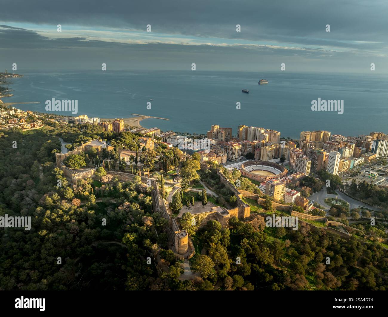 Aerial view of Malaga Alcazaba and Gibralfaro castle, crenellated wall ...