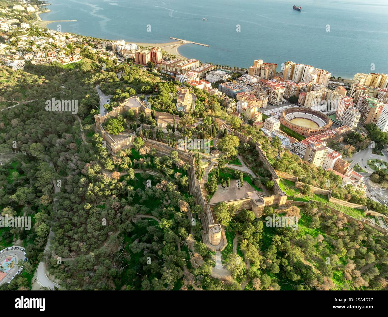 Aerial view of Malaga Alcazaba and Gibralfaro castle, crenellated wall ...