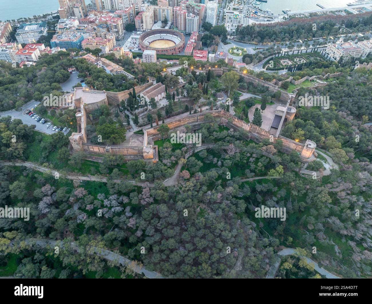 Aerial view of Malaga Alcazaba and Gibralfaro castle, crenellated wall ...