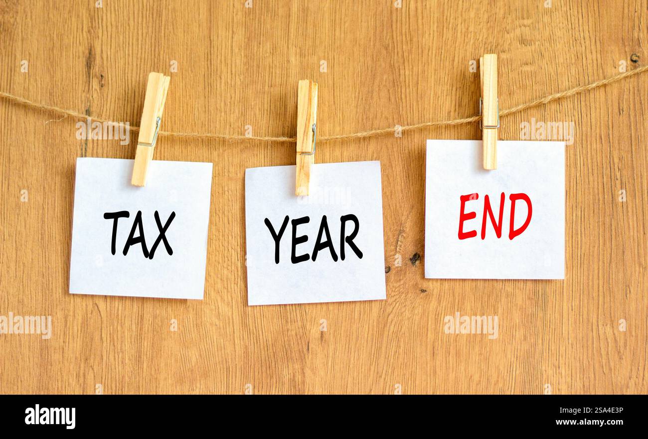 Tax year end symbol. Concept words Tax year end on beautiful white ...