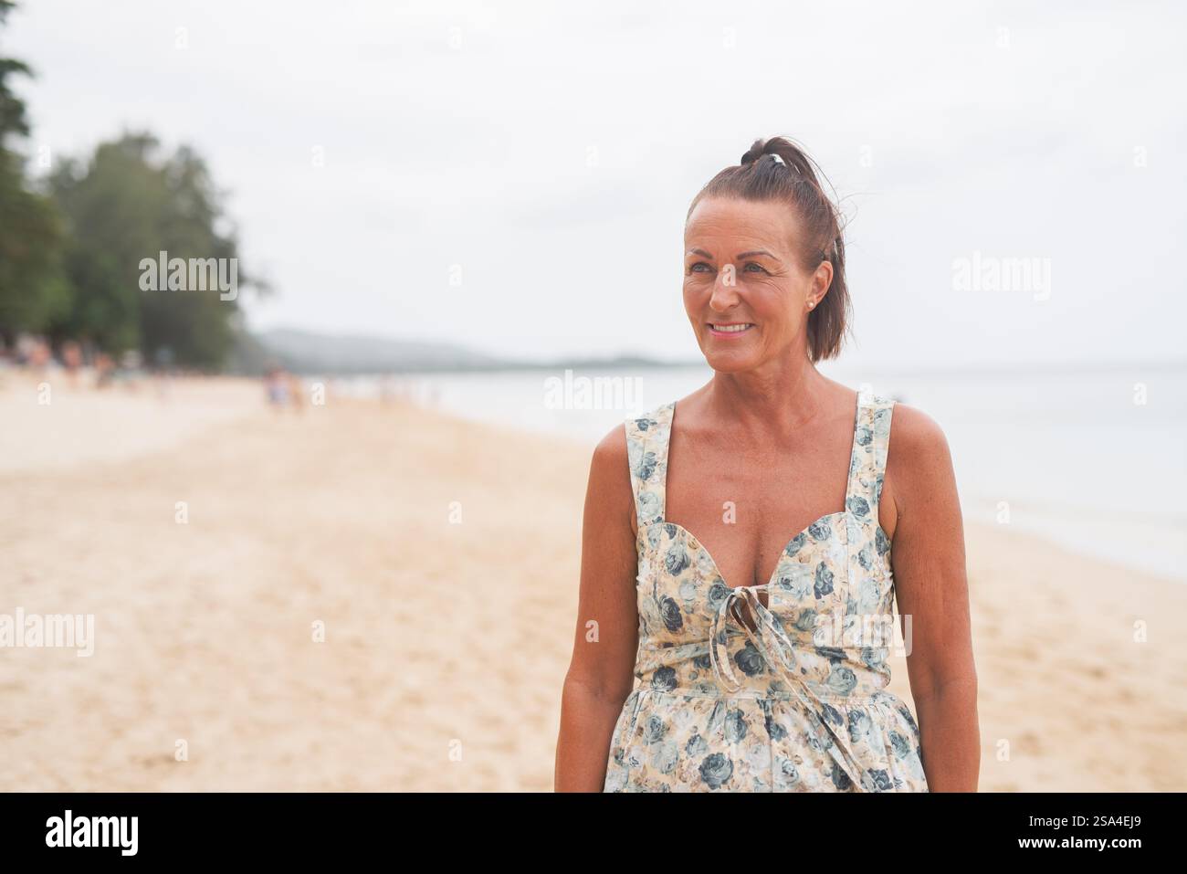 Beautiful mature Scandinavian woman in Thailand beach during summer ...